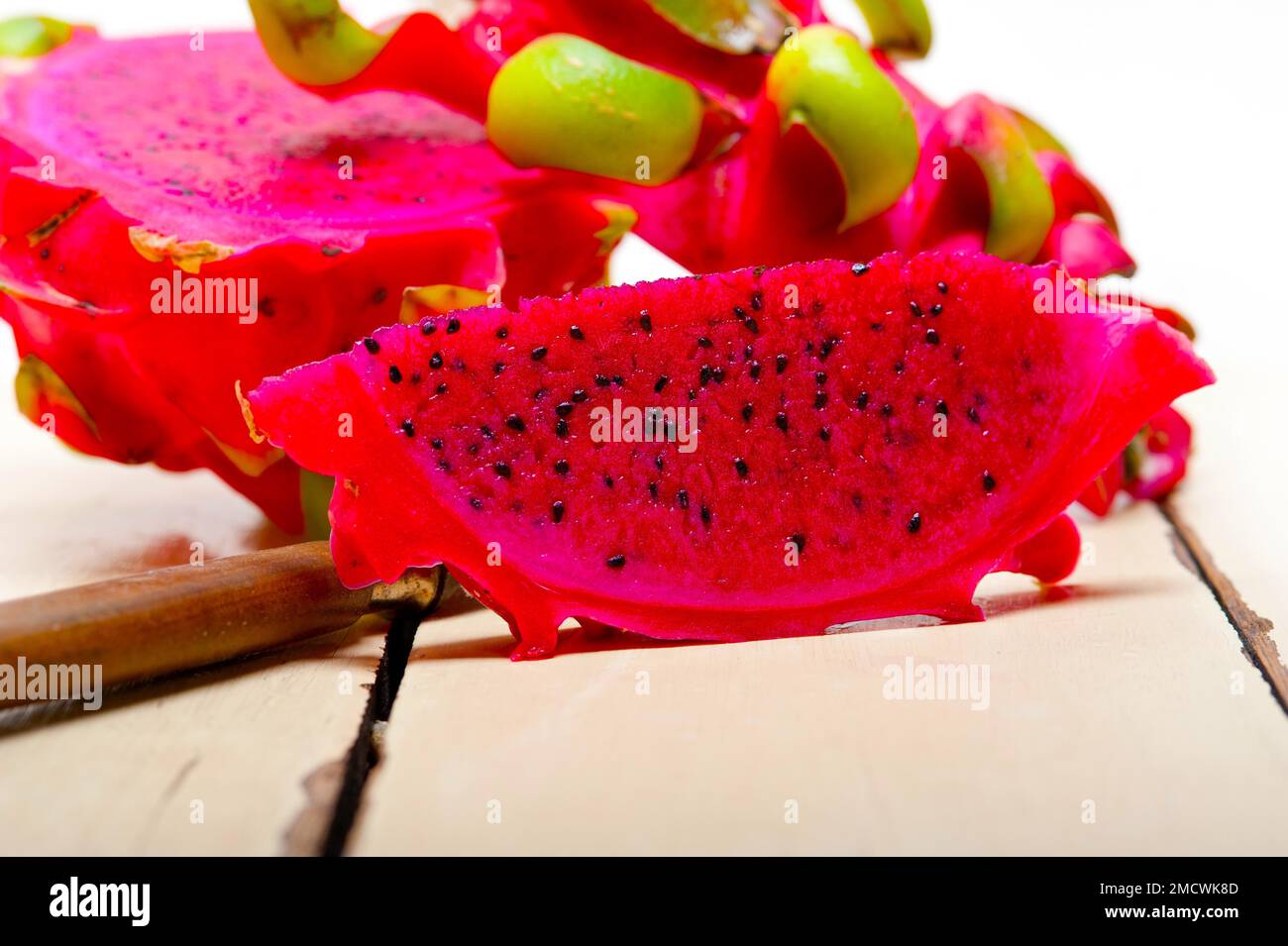 Fresh thai purple dragon fruit over white rustic table Stock Photo - Alamy