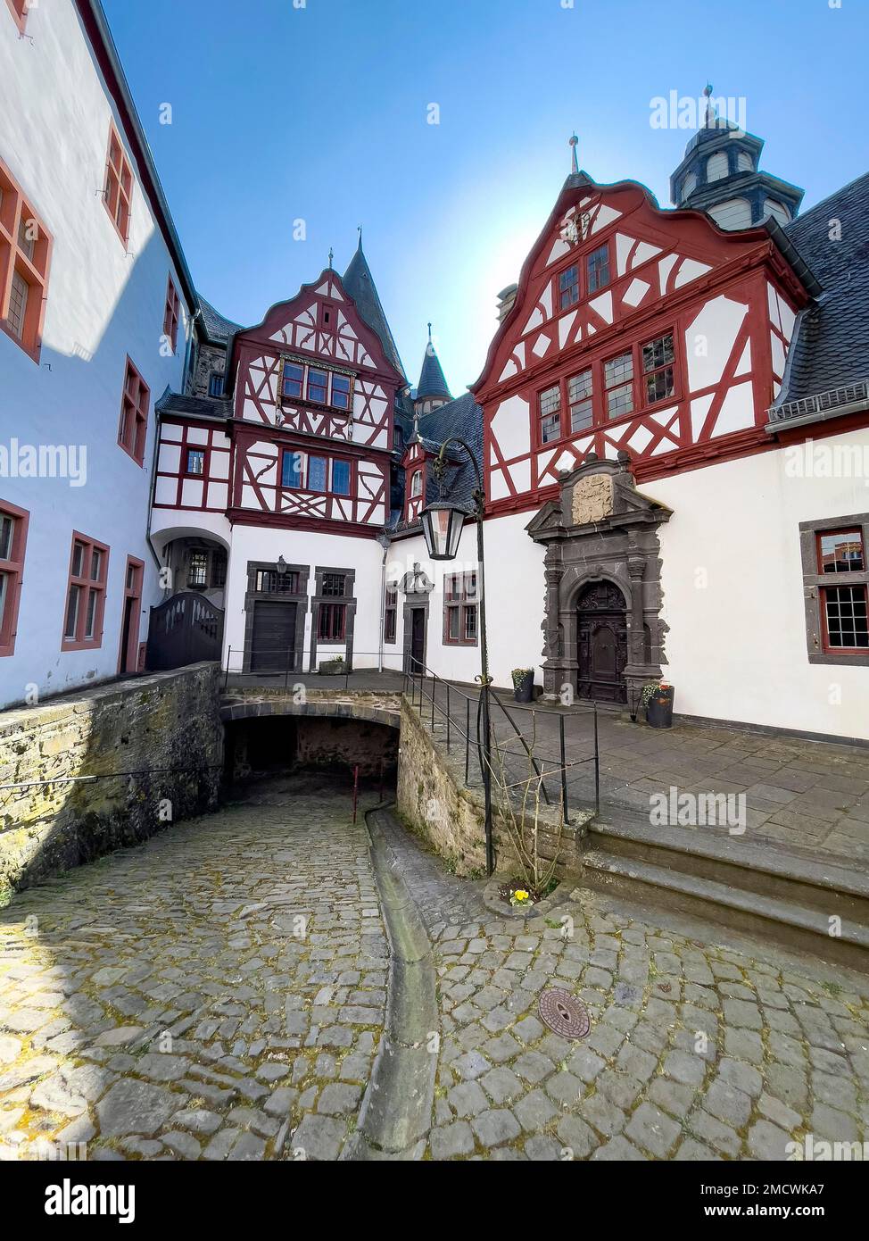 View from castle courtyard to buildings of Trier castle in double ...