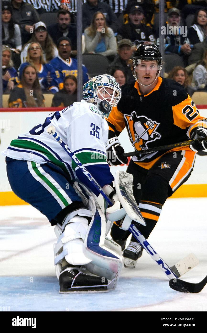 Vancouver Canucks goaltender Thatcher Demko (35) and Pittsburgh ...