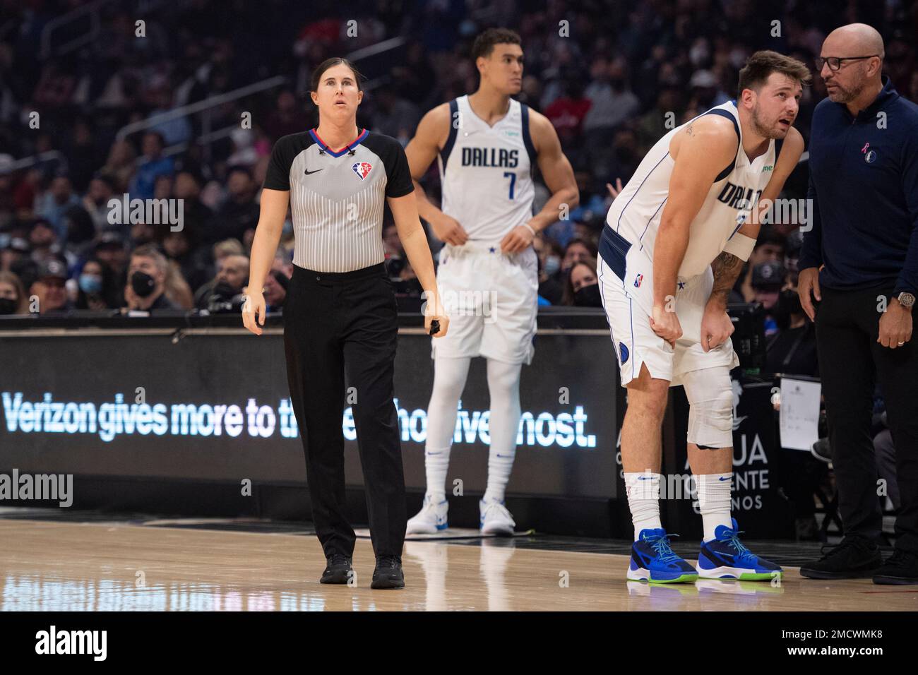 Referee Natalie Sago (9) stands near Dallas Mavericks center Dwight ...