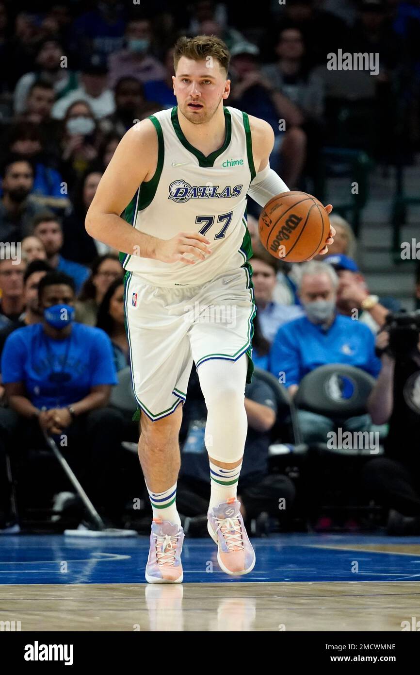 Dallas Mavericks' Luka Doncic handles the ball during an NBA basketball ...