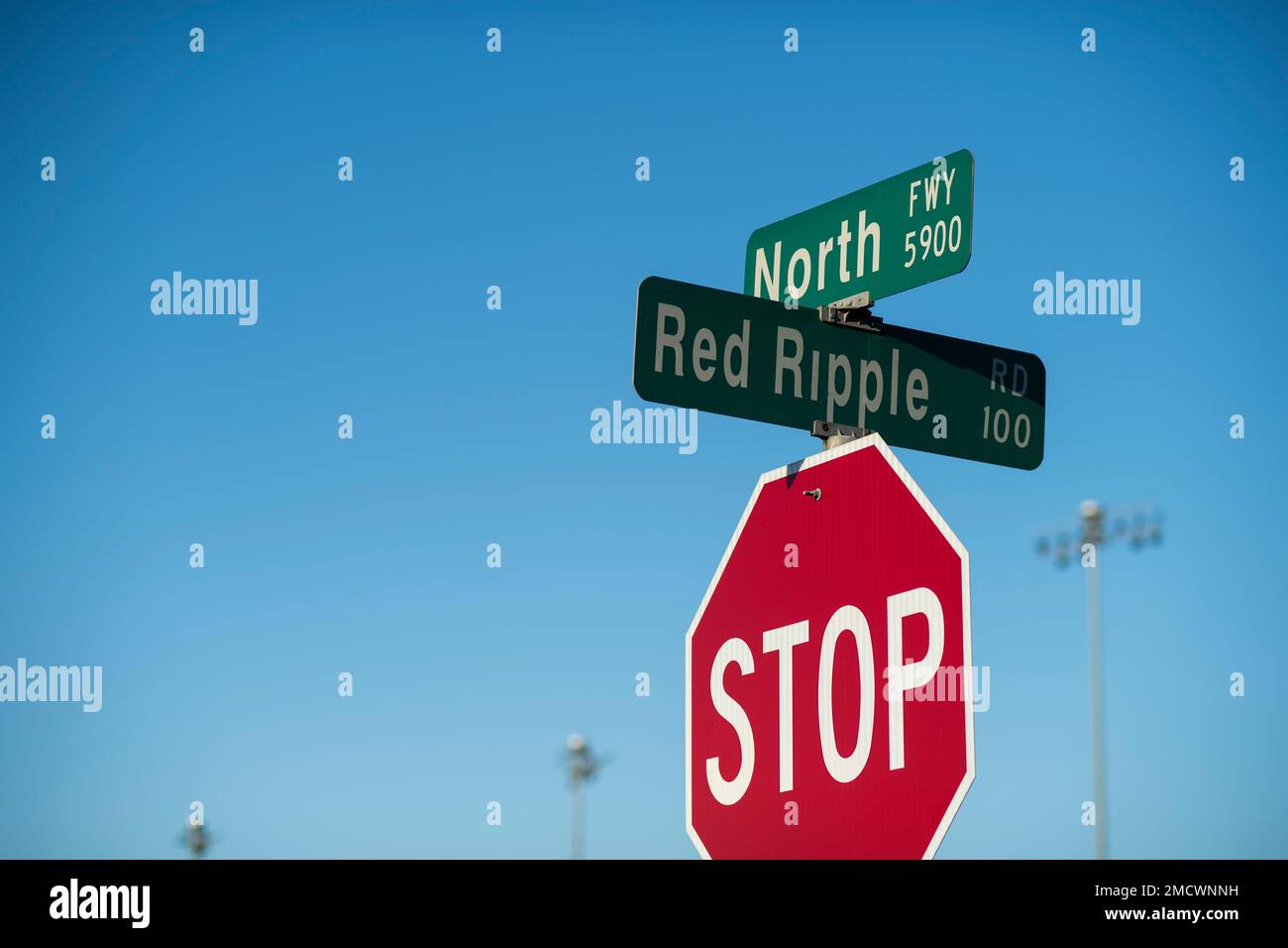 Street signs mark the corner of Red Ripple Road and the Interstate 45 ...