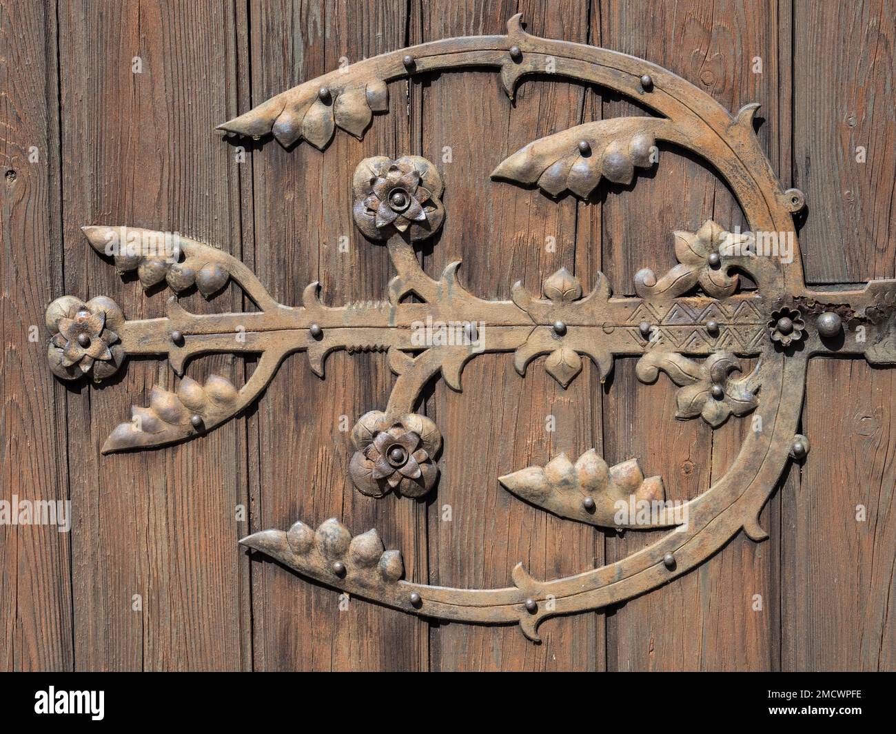 Artful wrought iron work, iron door fitting, Krieglach parish church ...