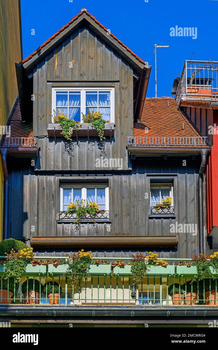 Board facade with dormer and floral decoration, Lindau, Swabia, Bavaria ...