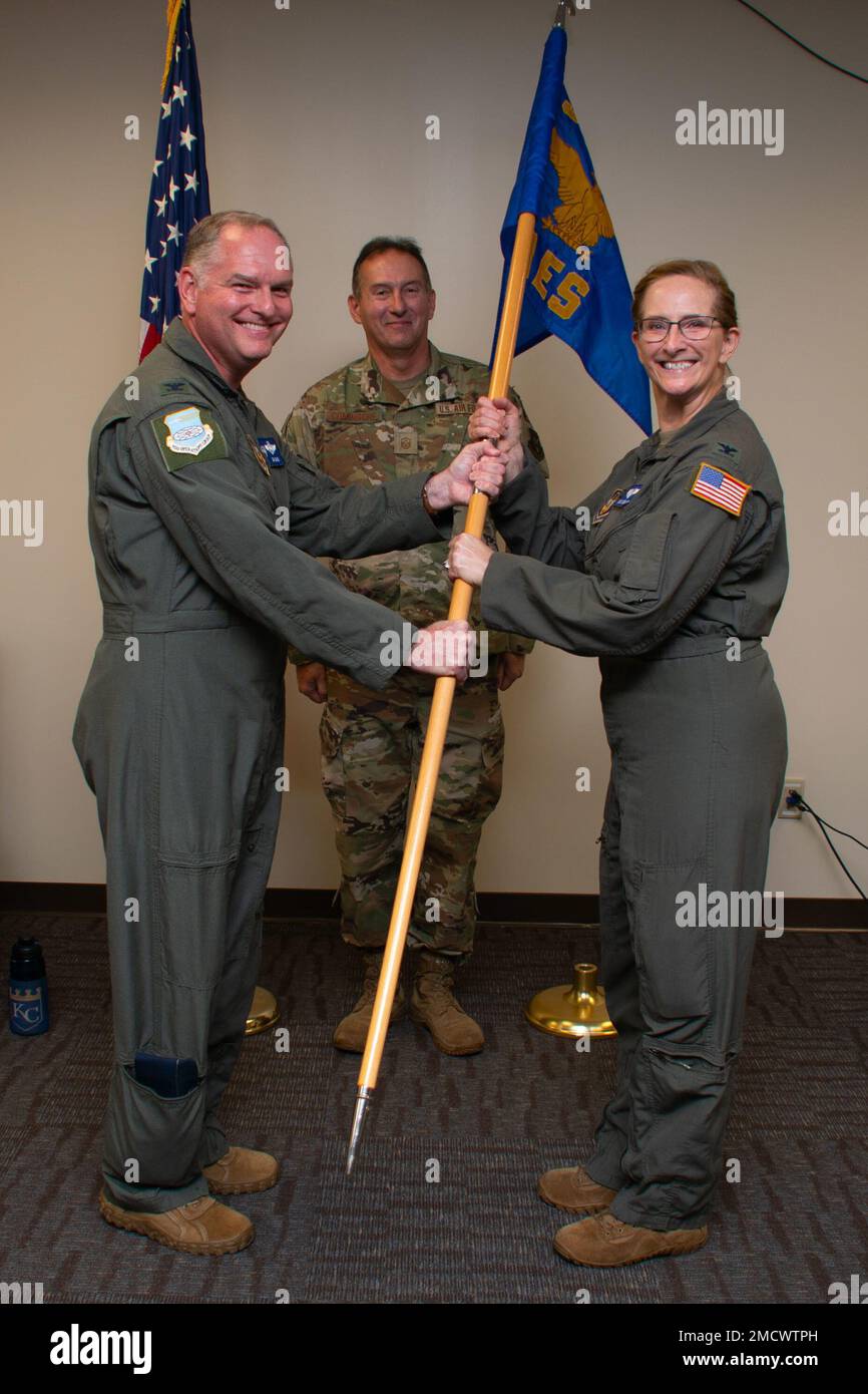 Col. Daniel Davis, 932nd Operations Group commander, passes the 932nd ...
