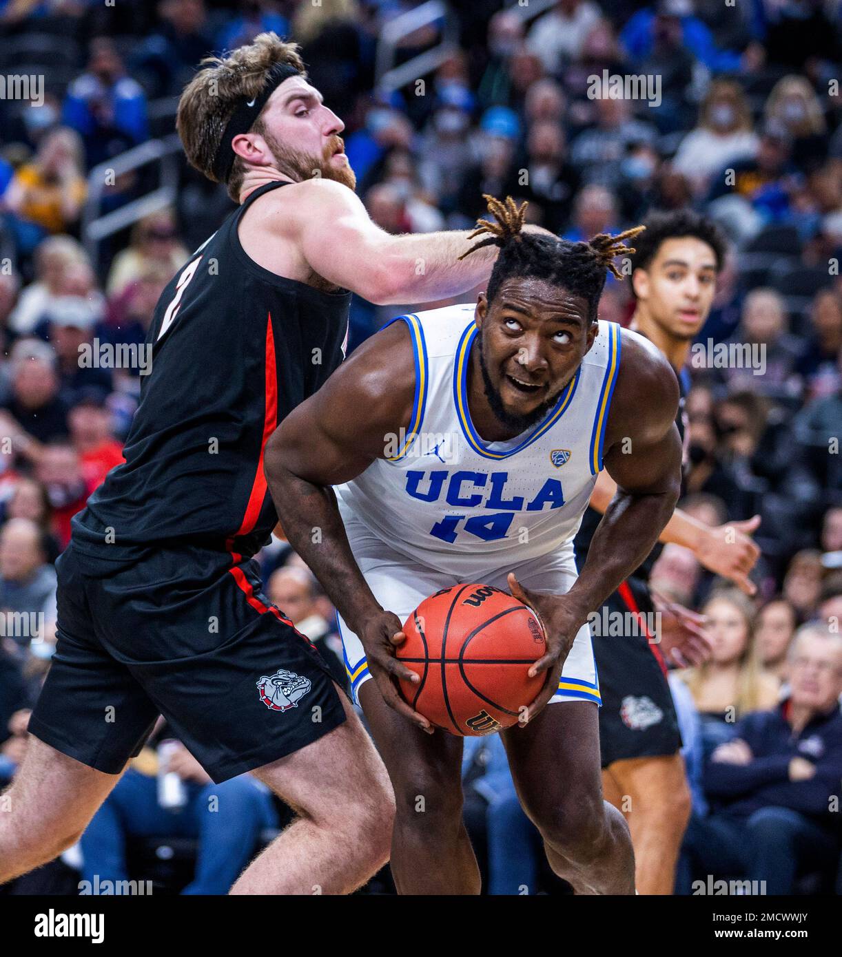 UCLA forward Kenneth Nwuba (14) looks to shoot while Gonzaga forward ...