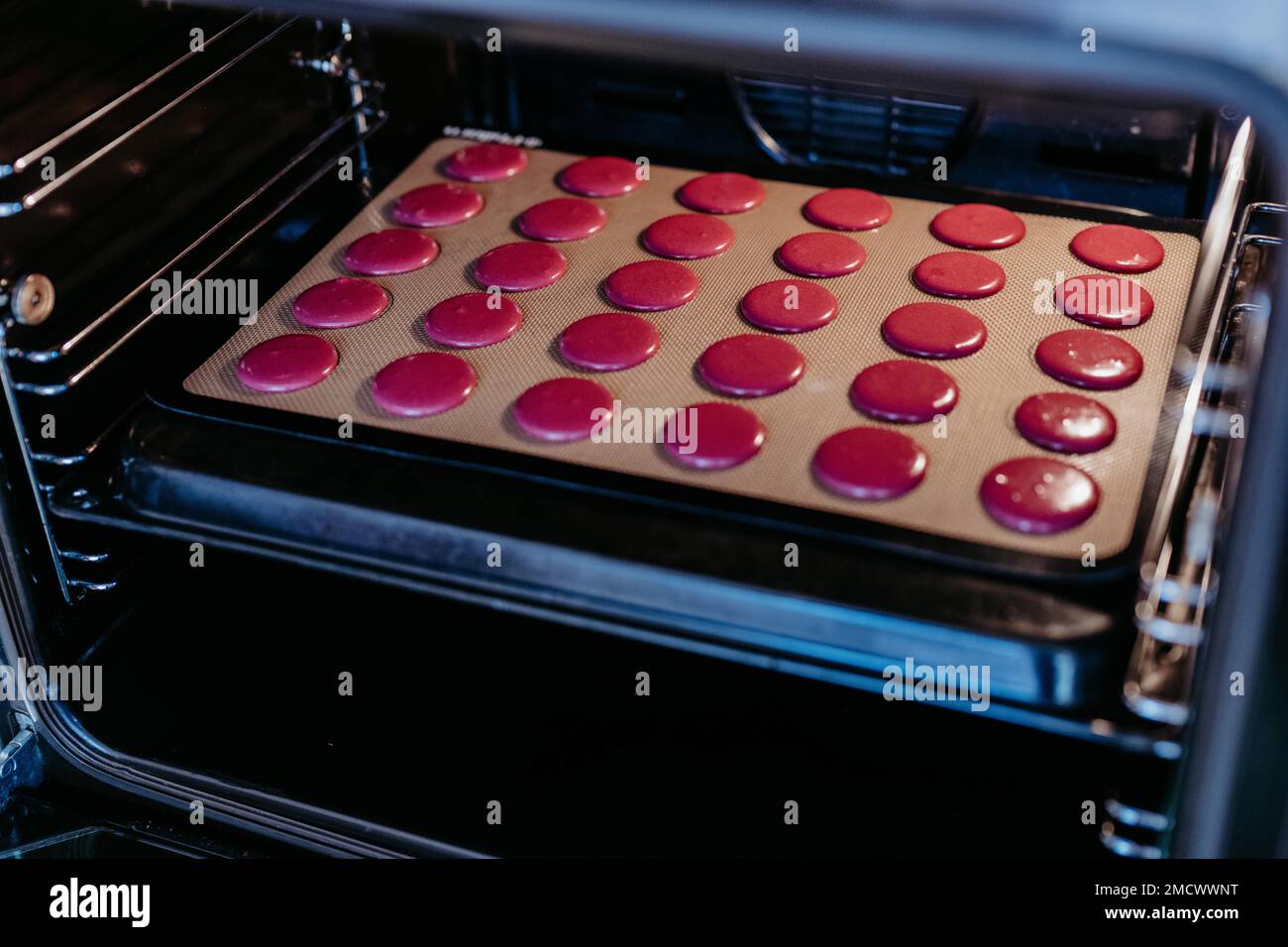 Macrones on the baking tray Stock Photo - Alamy