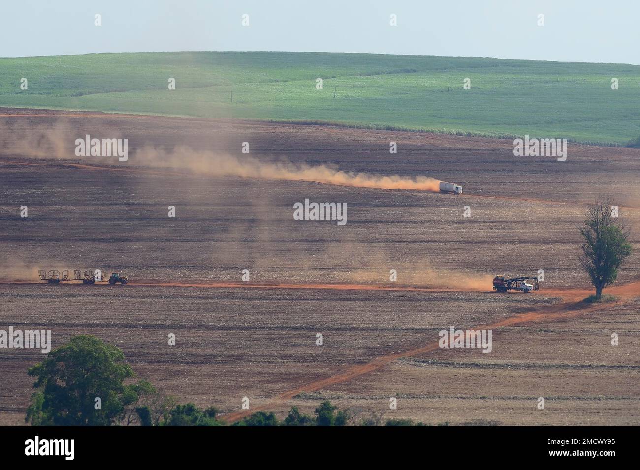 Agriculture vehicles in a harvested field, Parana, Brazil Stock Photo ...