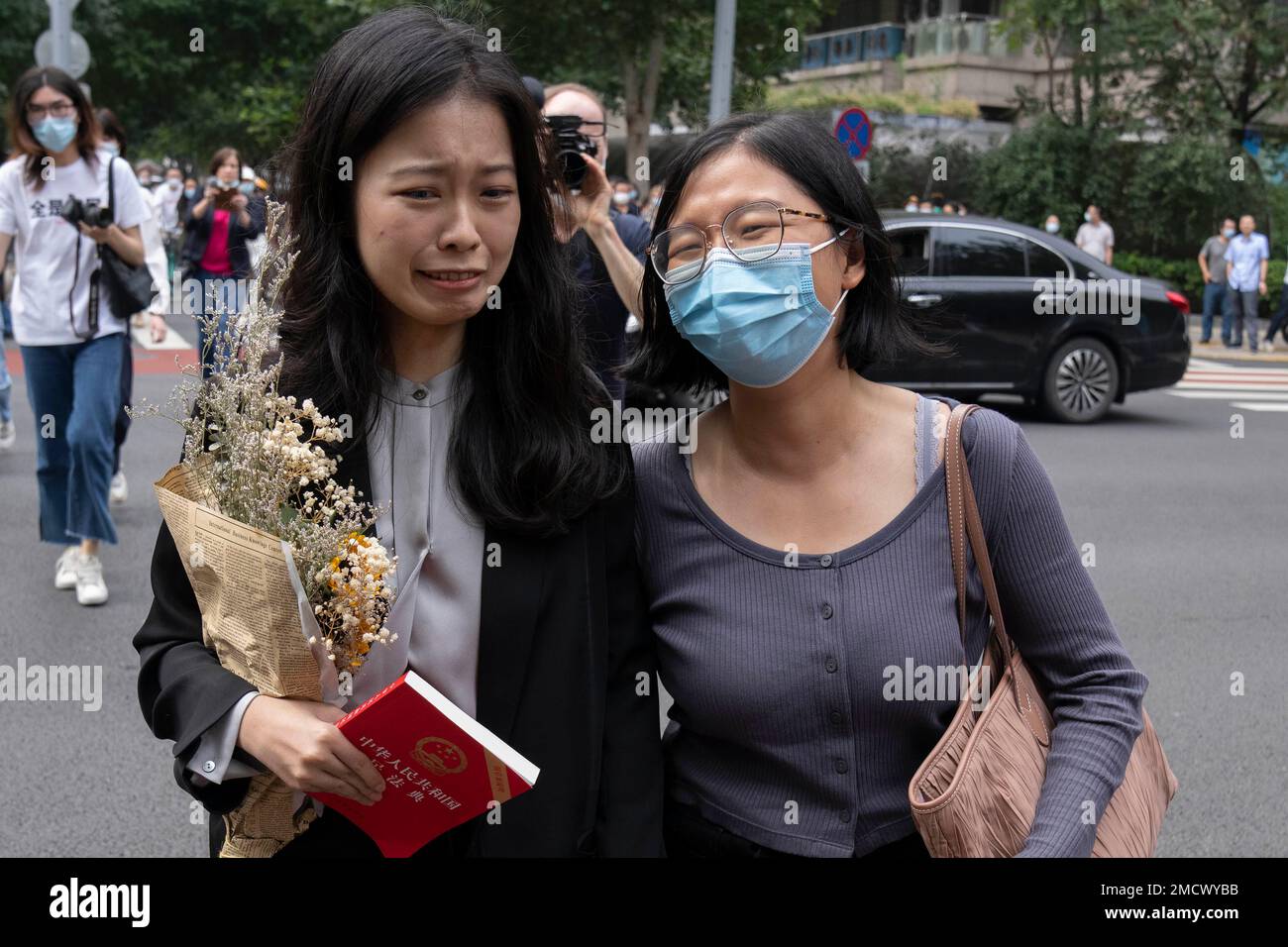 FILE - Zhou Xiaoxuan, left, a former intern at China's state ...