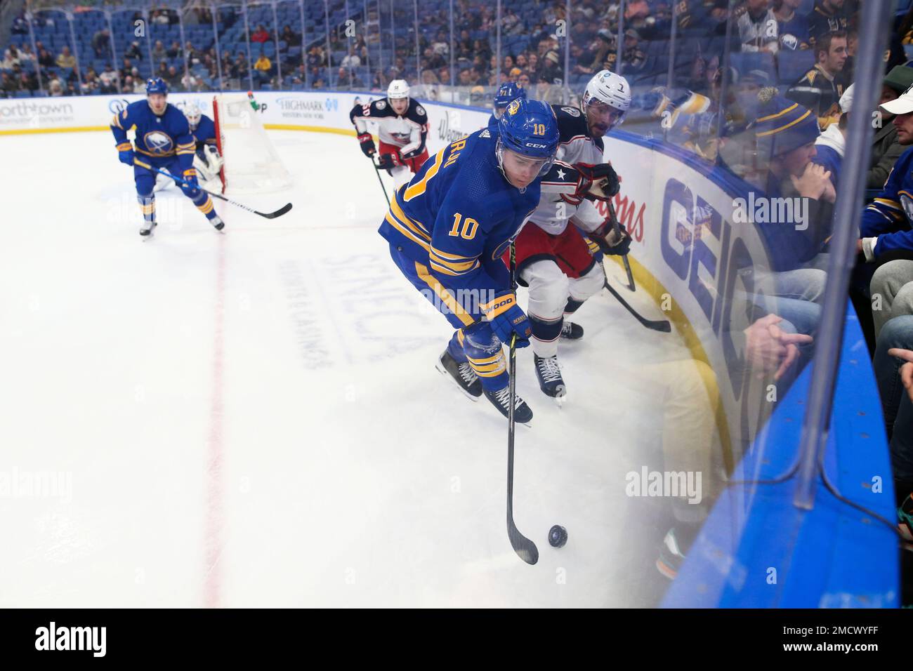 Buffalo Sabres defenseman Henri Jokiharju (10) gets the puck away from ...