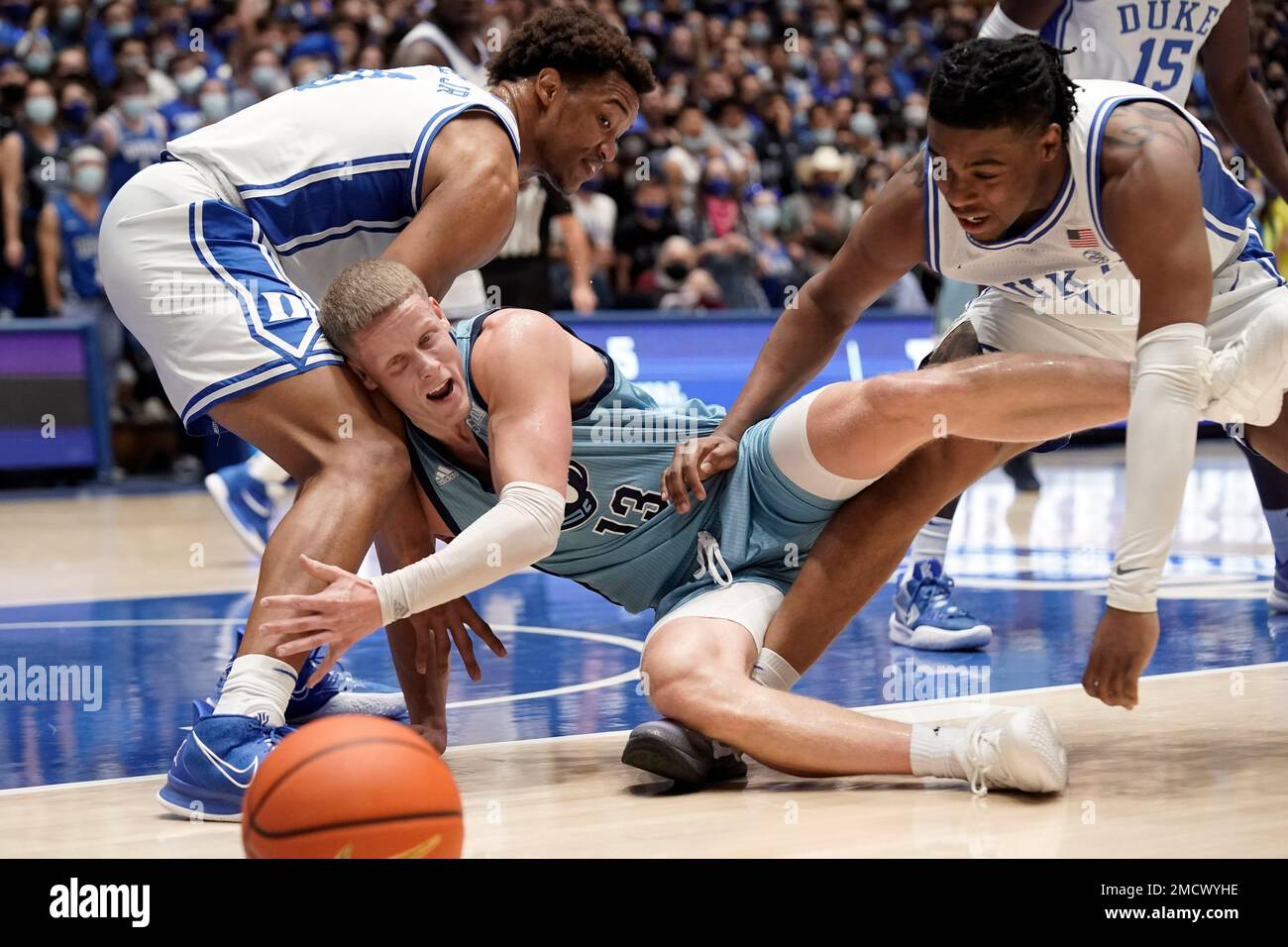 Duke forward Wendell Moore Jr., left, and guard Trevor Keels struggle ...
