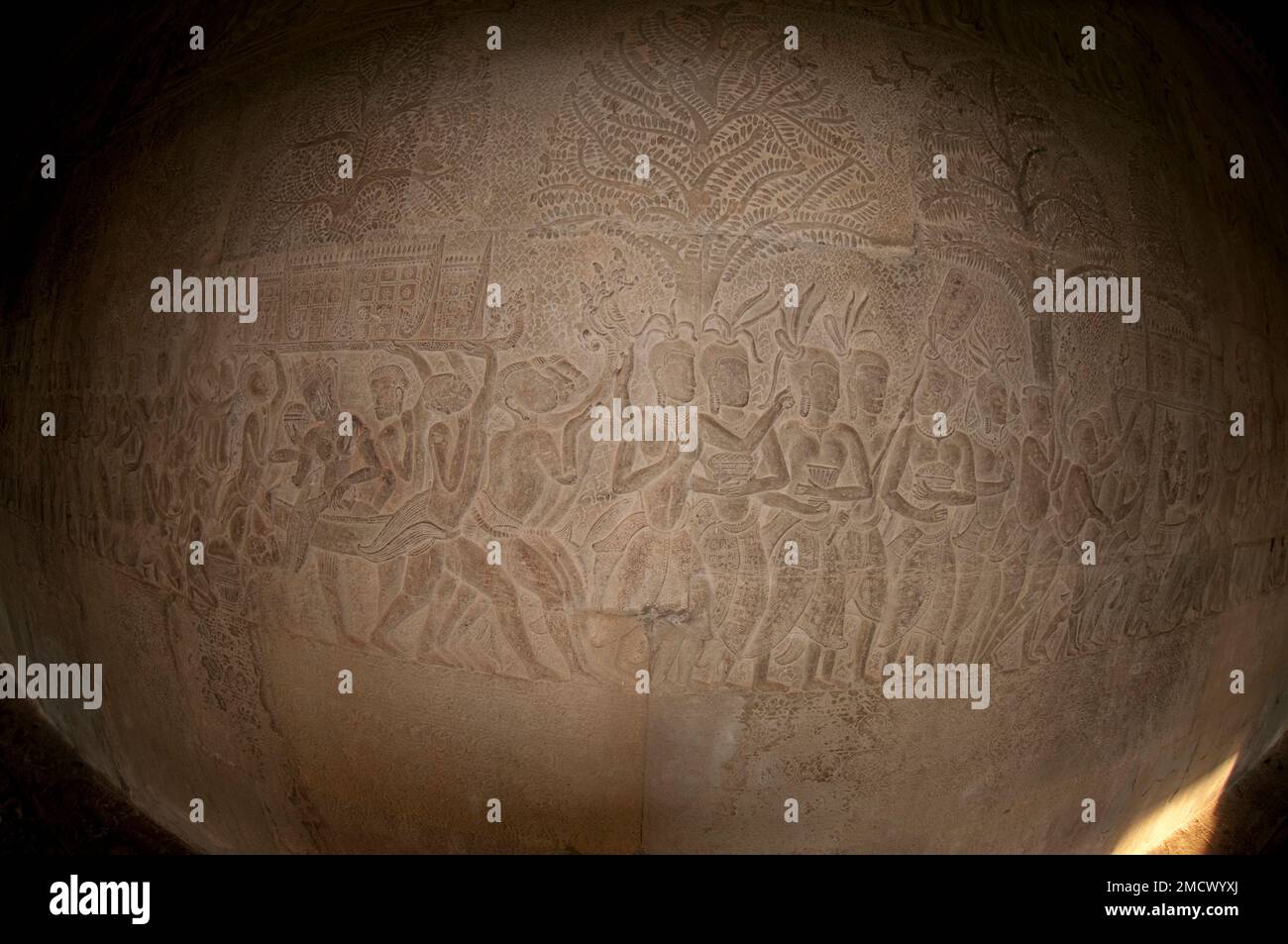 Carvings on wall of people in procession and carrying royalty, Angkor ...