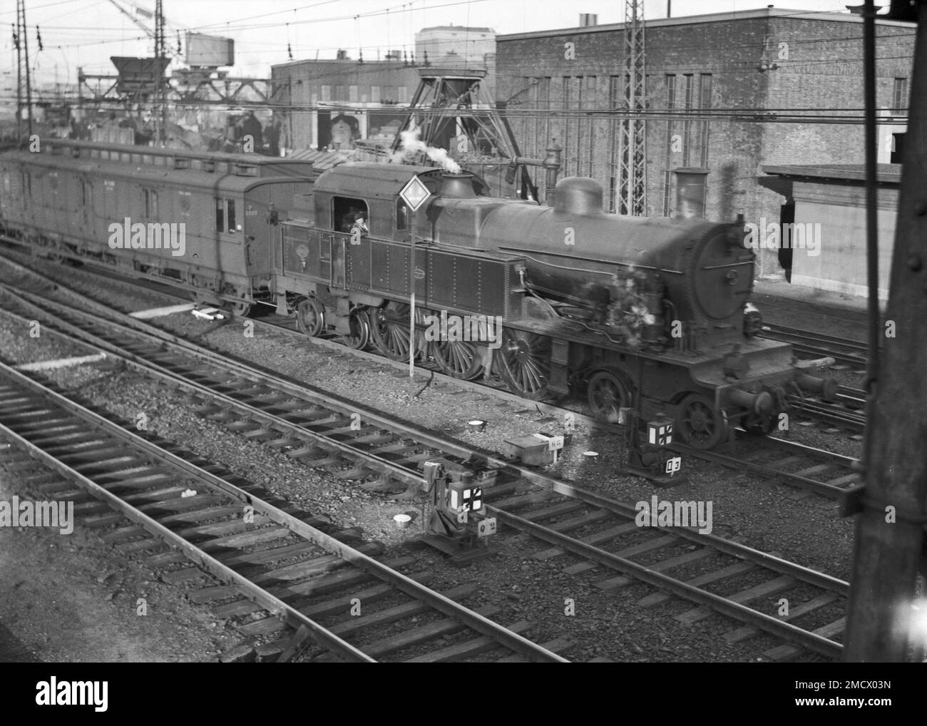 An NS 6000 with carriages near the yard on the east side of Amsterdam C ...