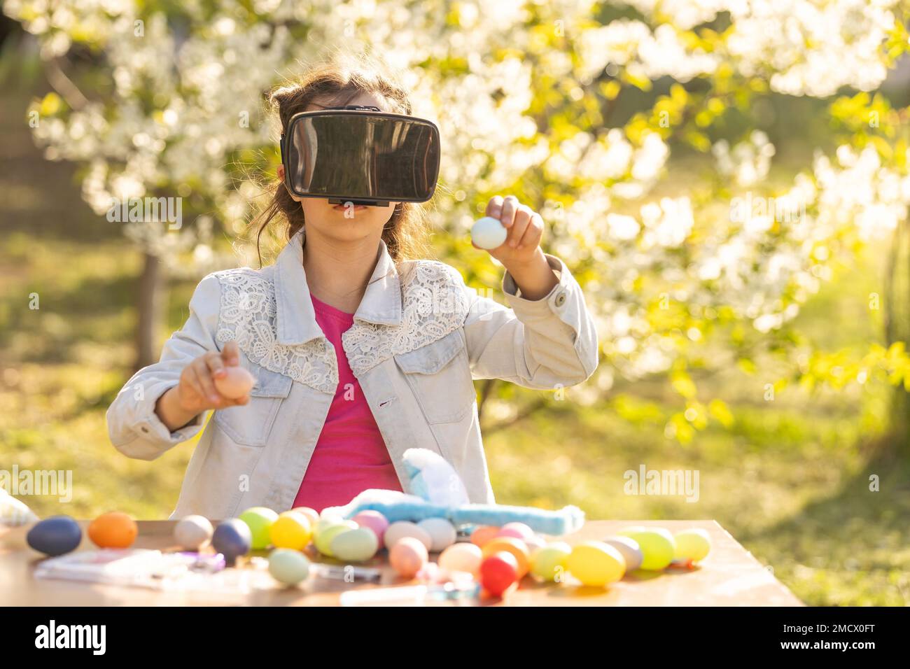 Teen gamer girl experiences fantasy world wearing virtual reality ...