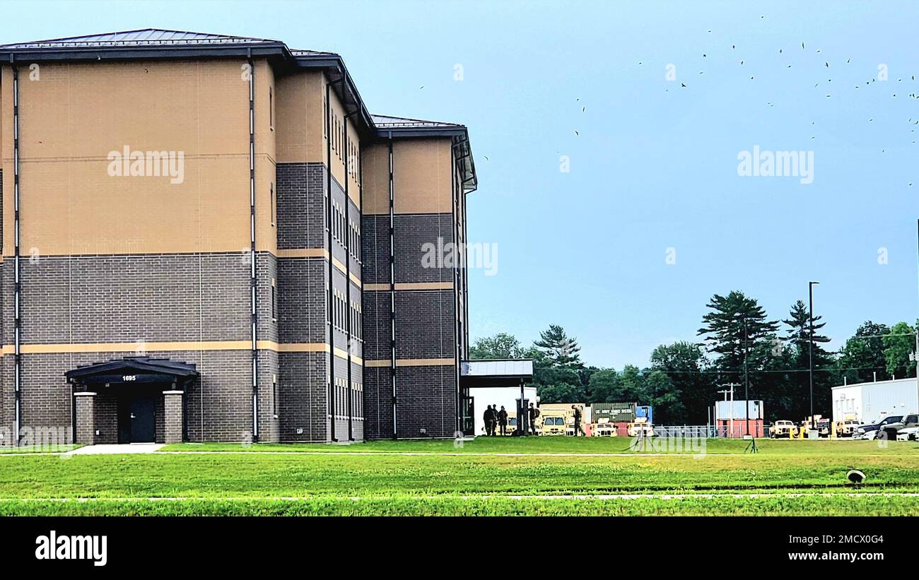Troops are located outside the first of several four-story transient ...