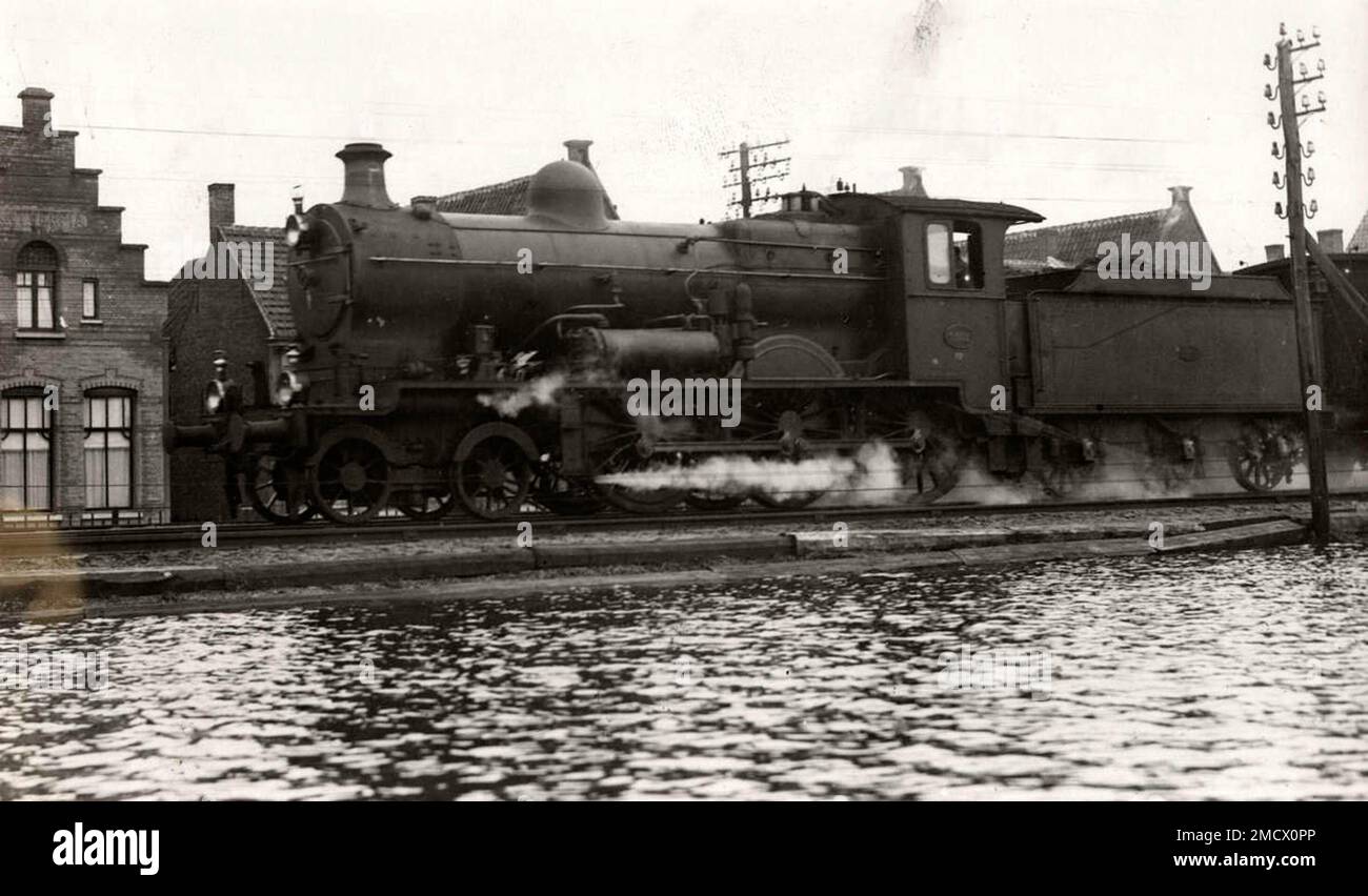 An NS 3500 series locomotive during a flood. (1926 Stock Photo - Alamy