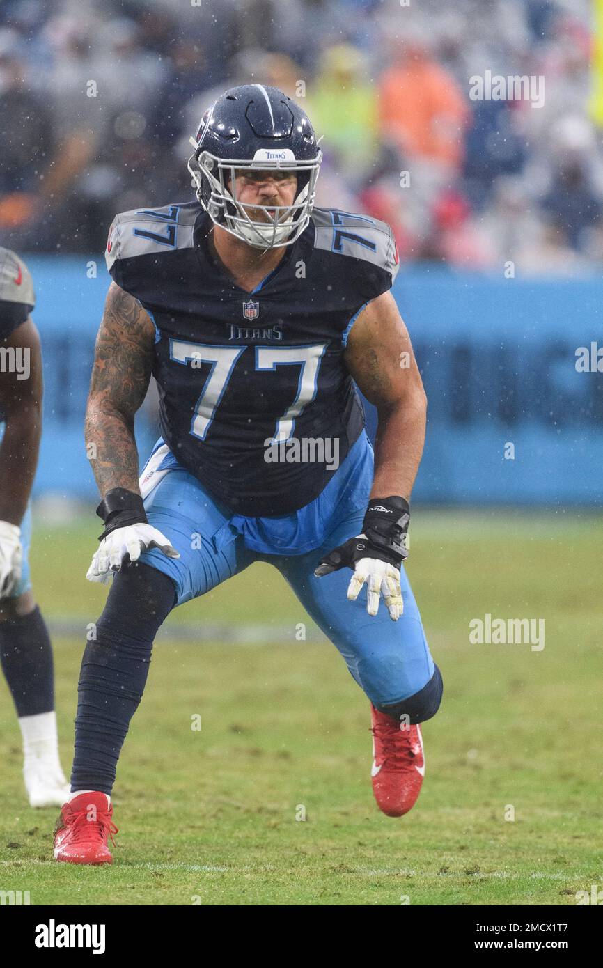 Tennessee Titans offensive tackle Taylor Lewan (77) comes off the field ...