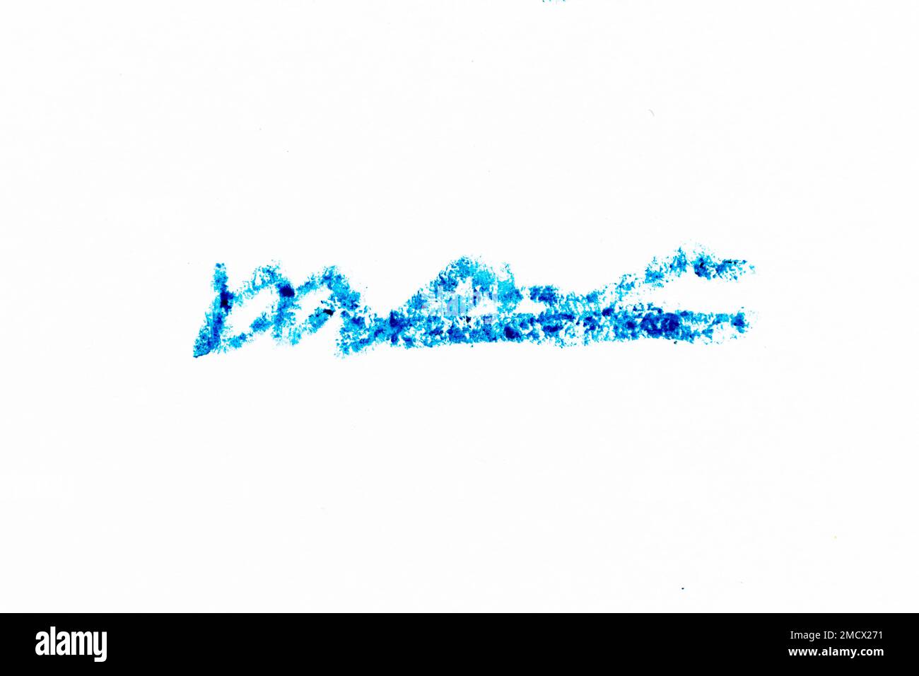 Blue color crayon hand drawing in sribble line shape on white paper ...