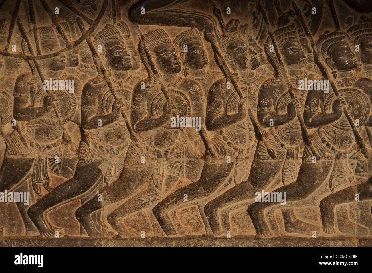 Carvings on wall of soldiers procession, Angkor Wat temple, Siem Riep ...