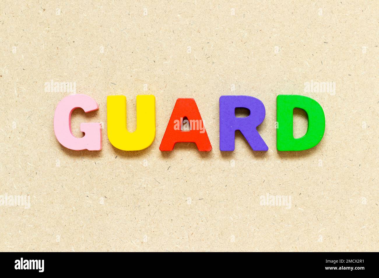 Color alphabet letter with word guard on wood background Stock Photo ...