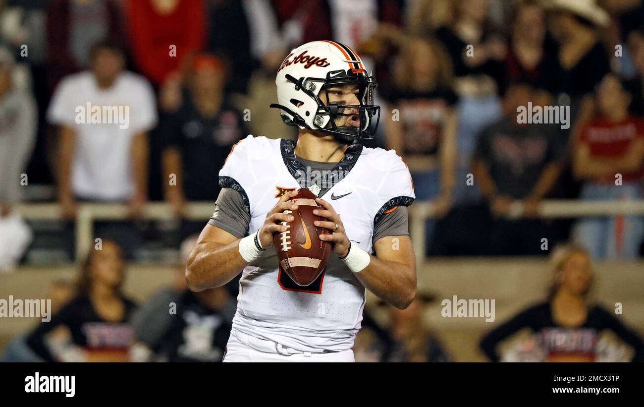 Oklahoma State's Spencer Sanders (3) drops back to pass the ball during ...