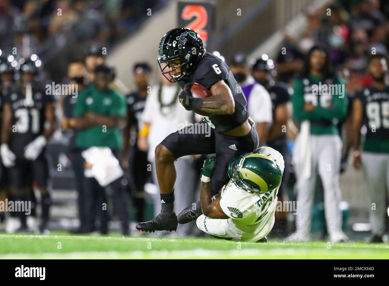 Hawaii wide receiver Zion Bowens (6) is tackled by Colorado State ...
