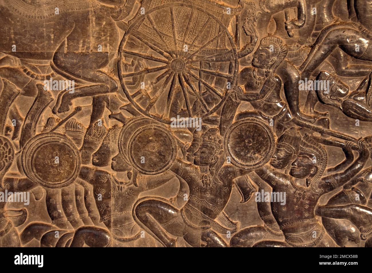 Carving of soldiers at Battle of Kurukshetra with chariot, Angkor Wat ...