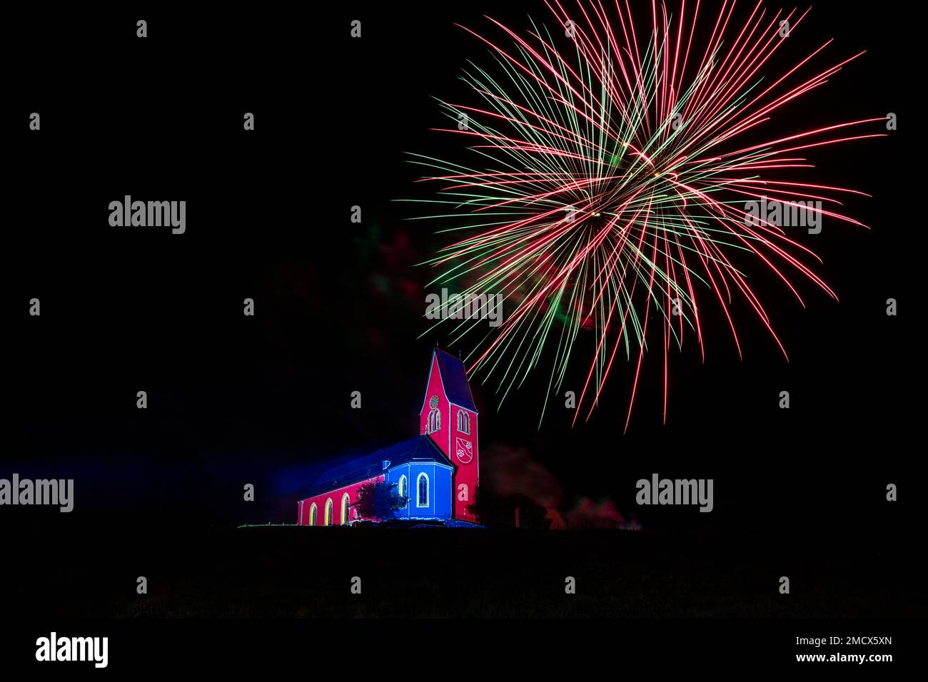 Fireworks over the church of Gamprin-Bendern, Liechtenstein Stock Photo ...
