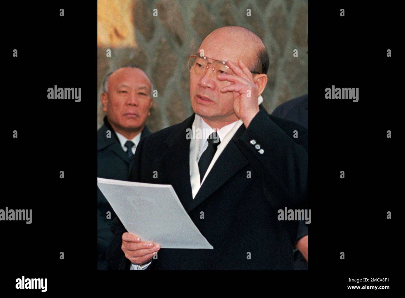 FILE - Former South Korean President Chun Doo-hwan speaks in front of ...