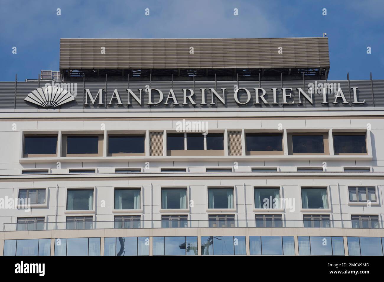 The logo of the Mandarin Oriental is seen on its hotel in Hong Kong ...