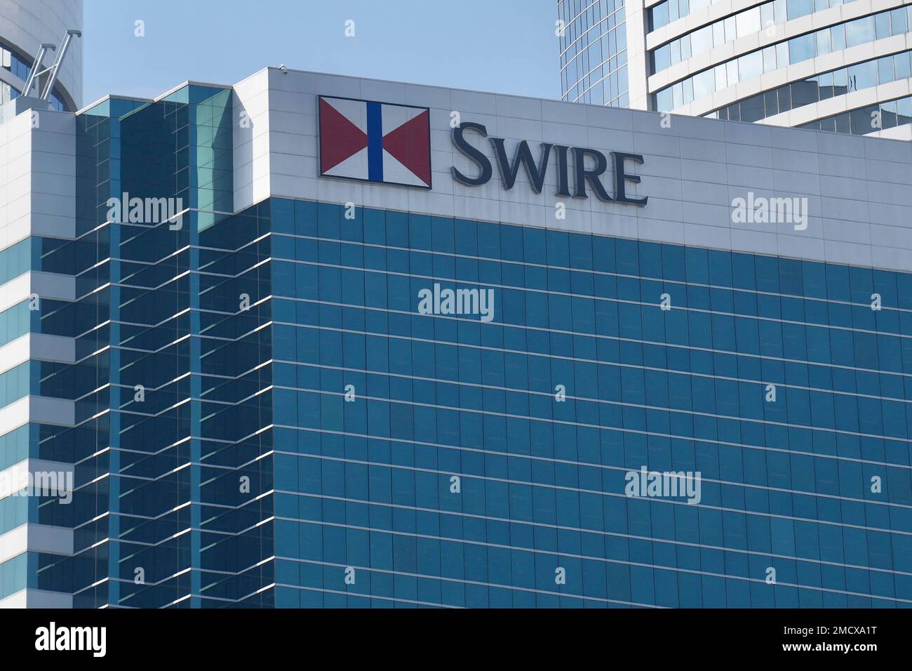 The logo of the Swire Pacific is seen on its headquarters in Hong Kong ...