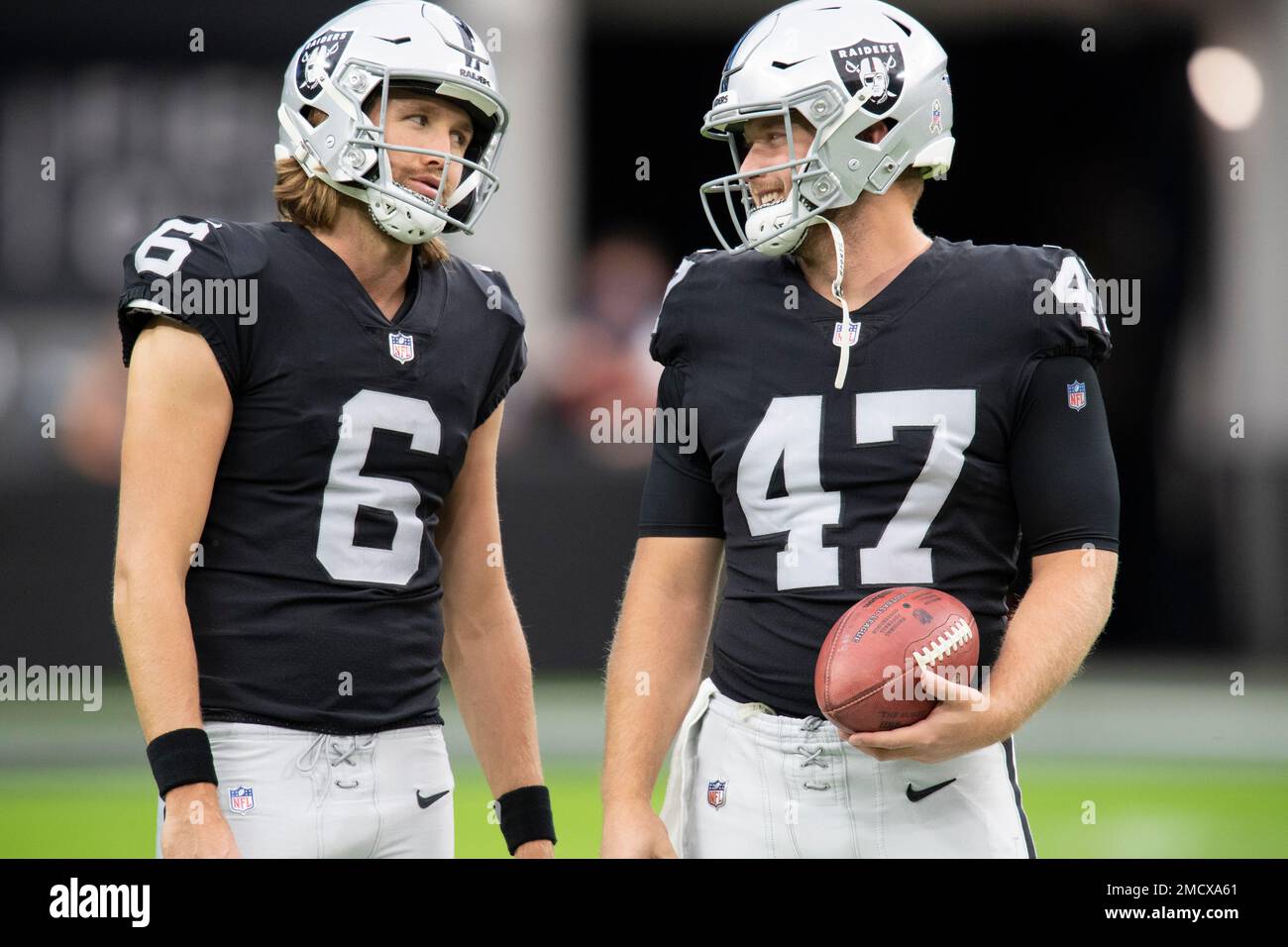 Las Vegas Raiders punter A.J. Cole (6) and long snapper Trent Sieg (47 ...