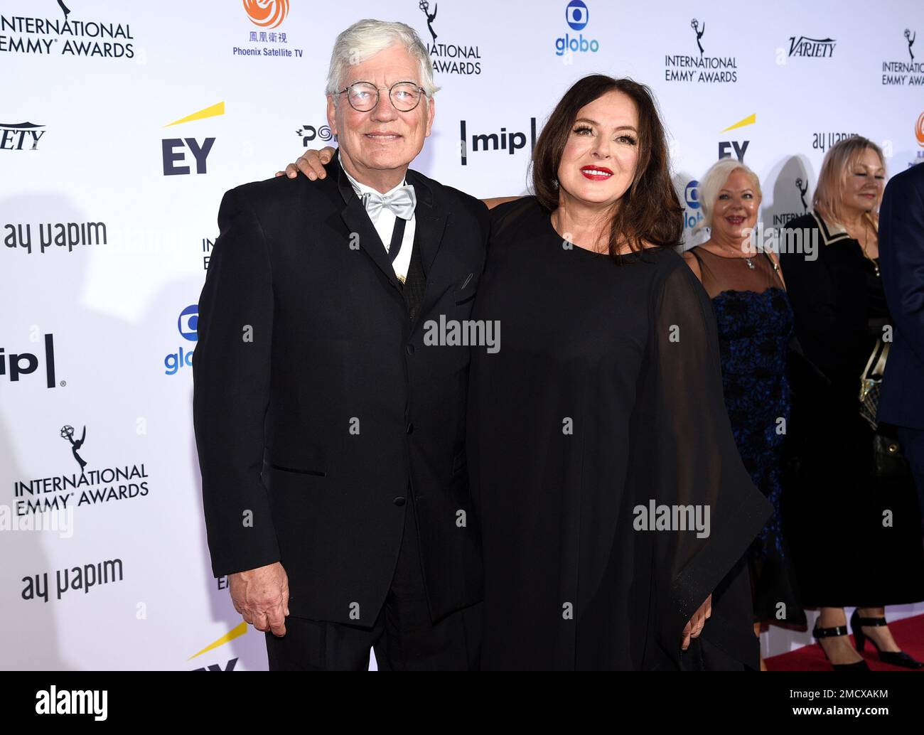 Peter Raymont, left, and Phyllis Ellis attend the 49th International ...