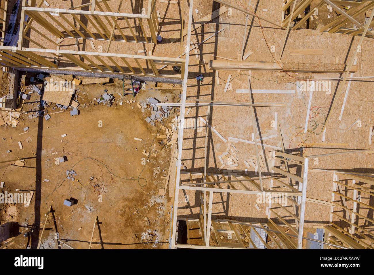 Framework beams of under construction new house being built in ...