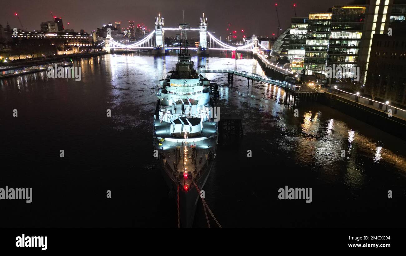 An aerial view of illuminated cruiser ship in the River Thames with ...