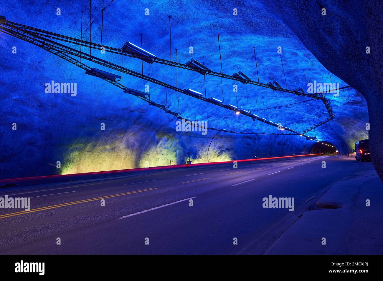 blue light of the interior of the underground Laerdal tunnel, the ...