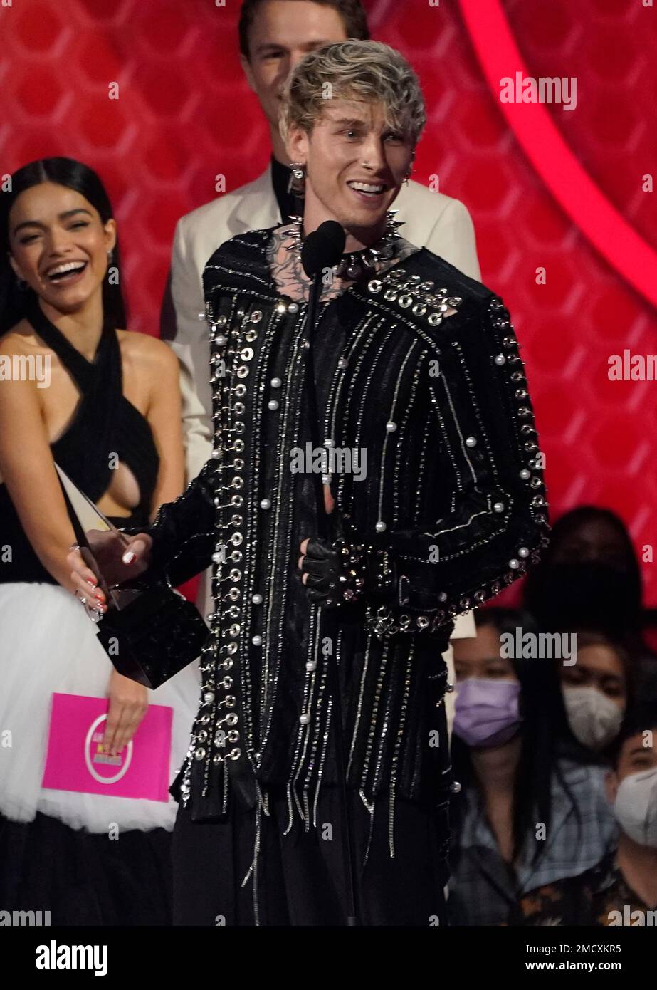 Machine Gun Kelly accepts the award for favorite rock artist at the ...