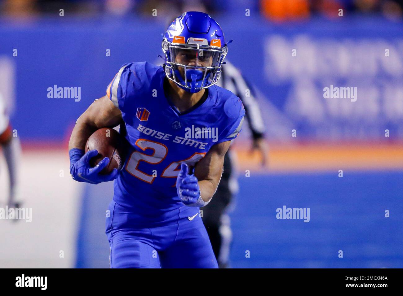 Boise State running back George Holani (24) runs with the ball down the ...
