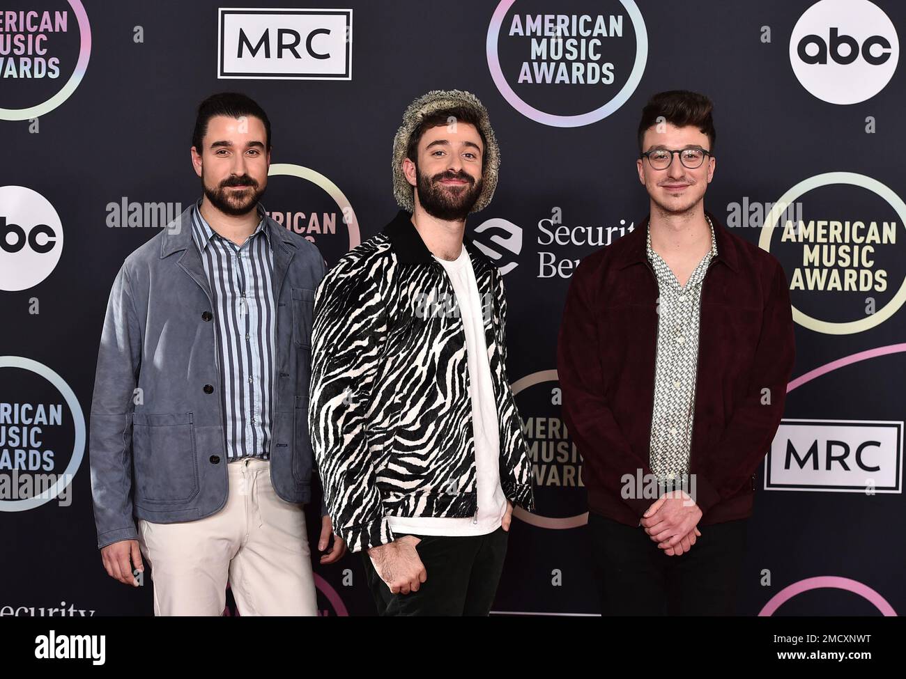 Adam Brett Met, from left, Jack Met and Ryan Met of AJR arrive at the ...