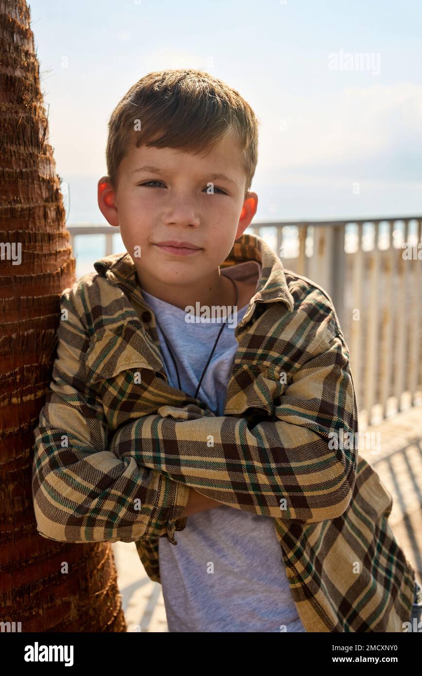 Portrait of a sad boy on a sunny day Stock Photo - Alamy