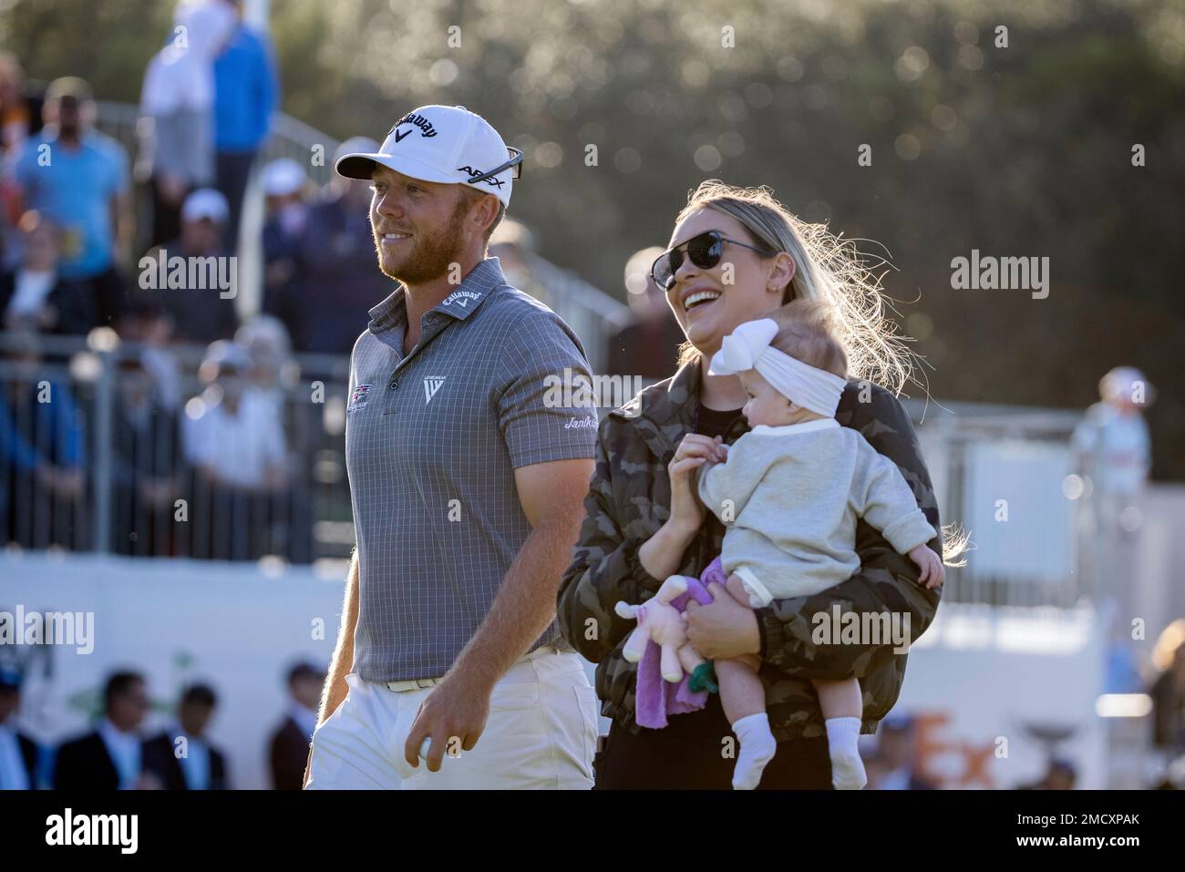 Talor Gooch, left, and his wife Ally and 4-month-old daughter Collins ...