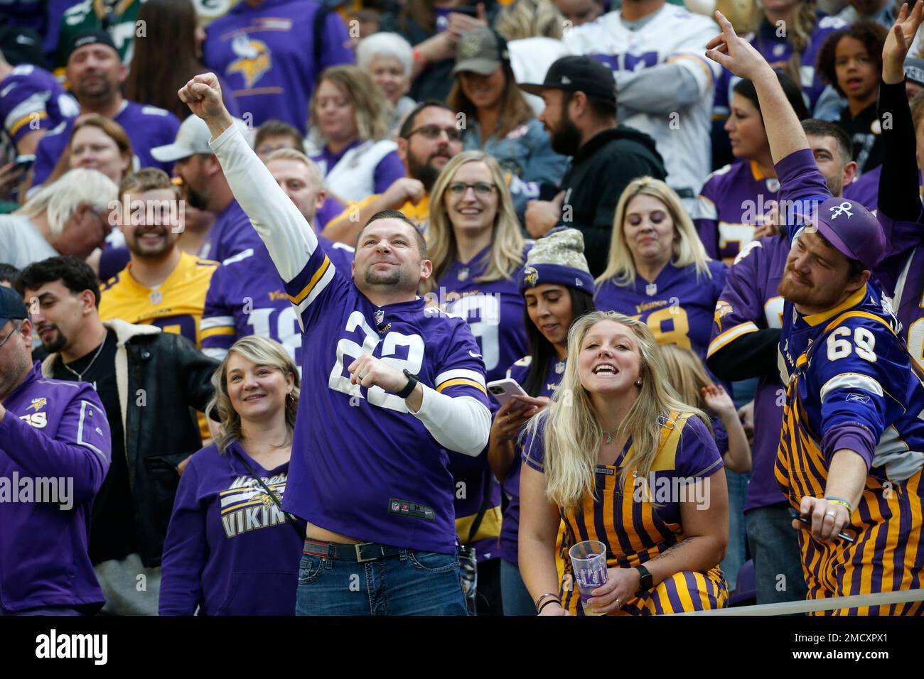 Fans cheer during the second half of an NFL football game between the ...
