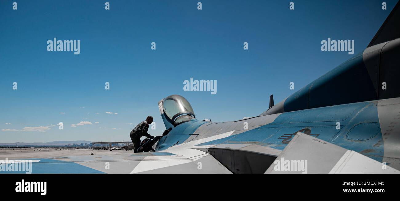 Col. Michael Cabral, 926th Wing vice commander, climbs into an F-16 ...
