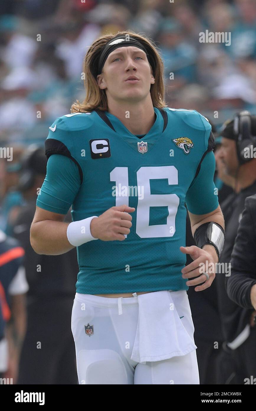 Jacksonville Jaguars quarterback Trevor Lawrence runs before the first ...