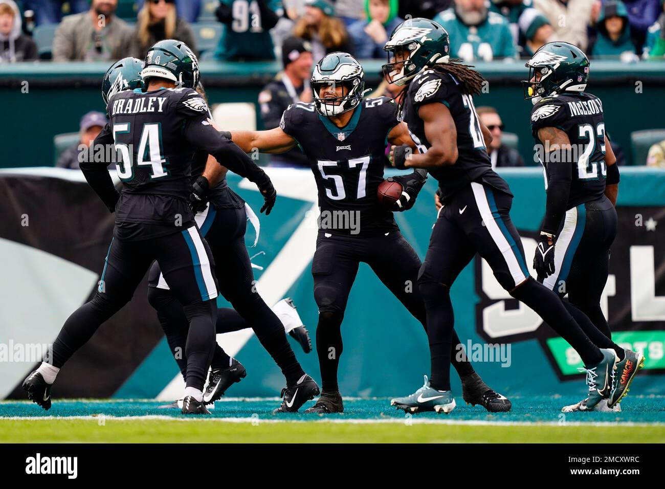 Philadelphia Eagles' T.J. Edwards (57) celebrates with teammates after ...
