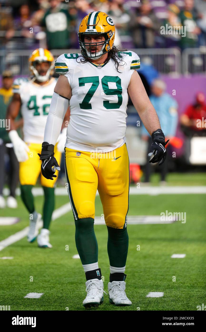 Green Bay Packers guard Royce Newman (70) walks on the field before an ...