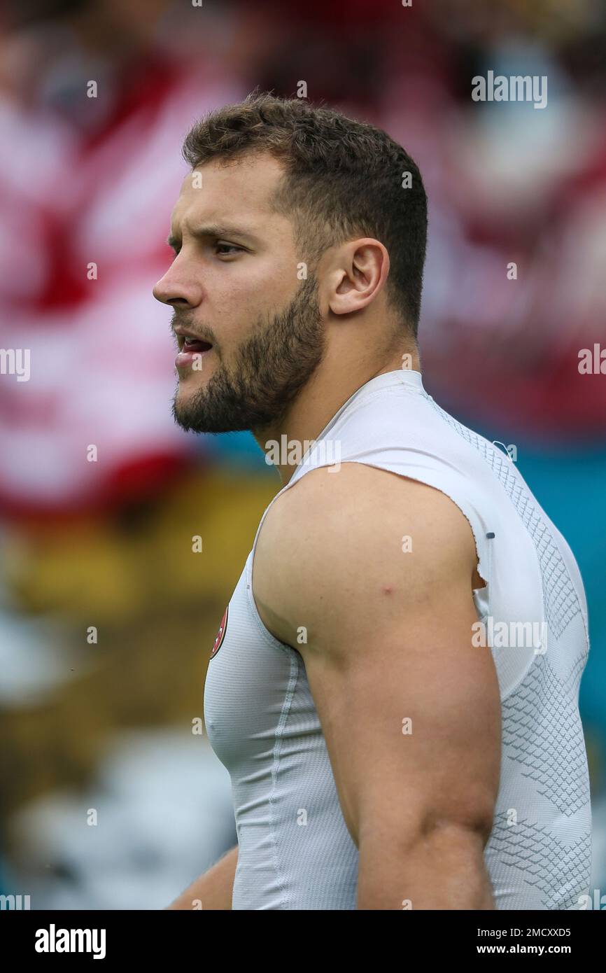 San Francisco 49ers defensive end Nick Bosa (97) walks onto the field ...