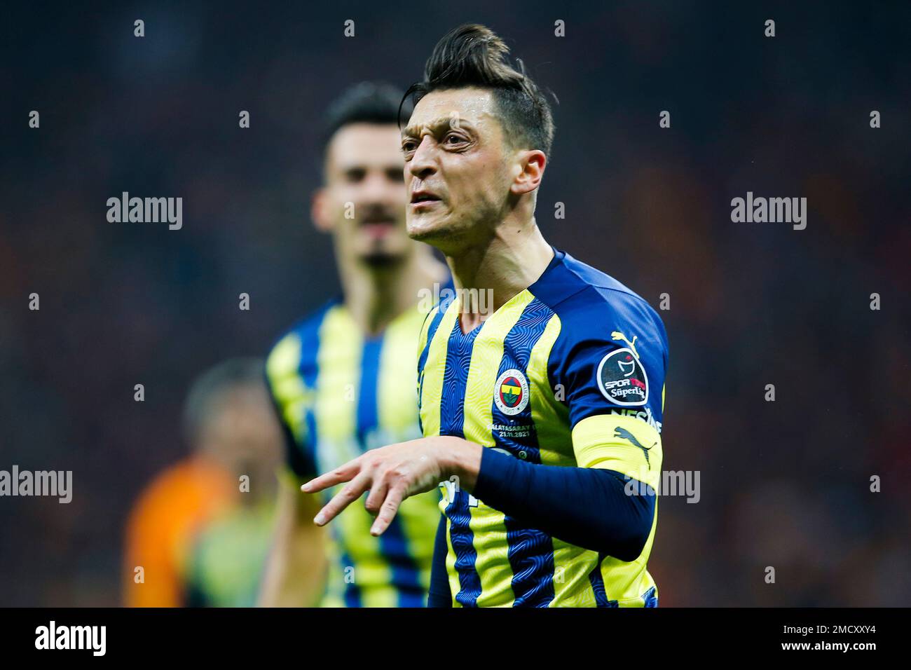 Fenerbahce's Mesut Ozil celebrates after scoring his side's first goal ...