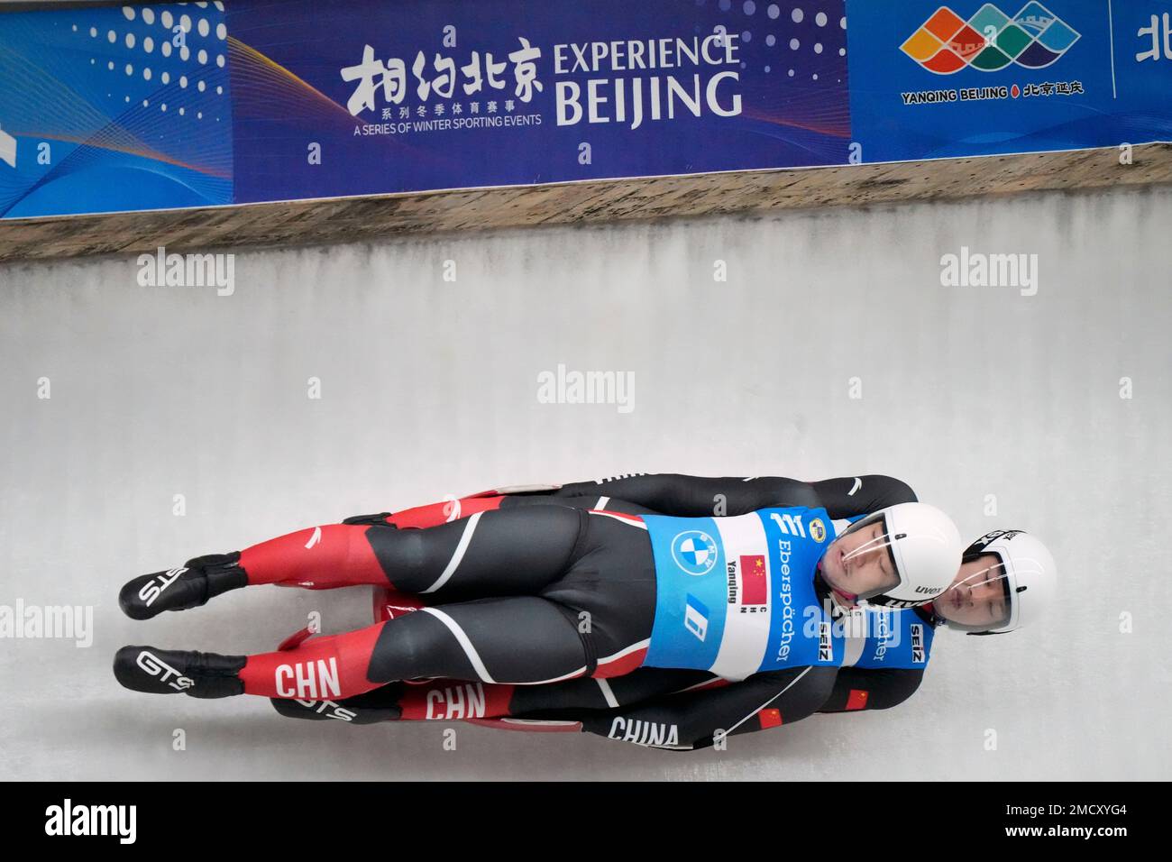 Huang Yebo and Peng Junyue of China compete in the relay race at the ...