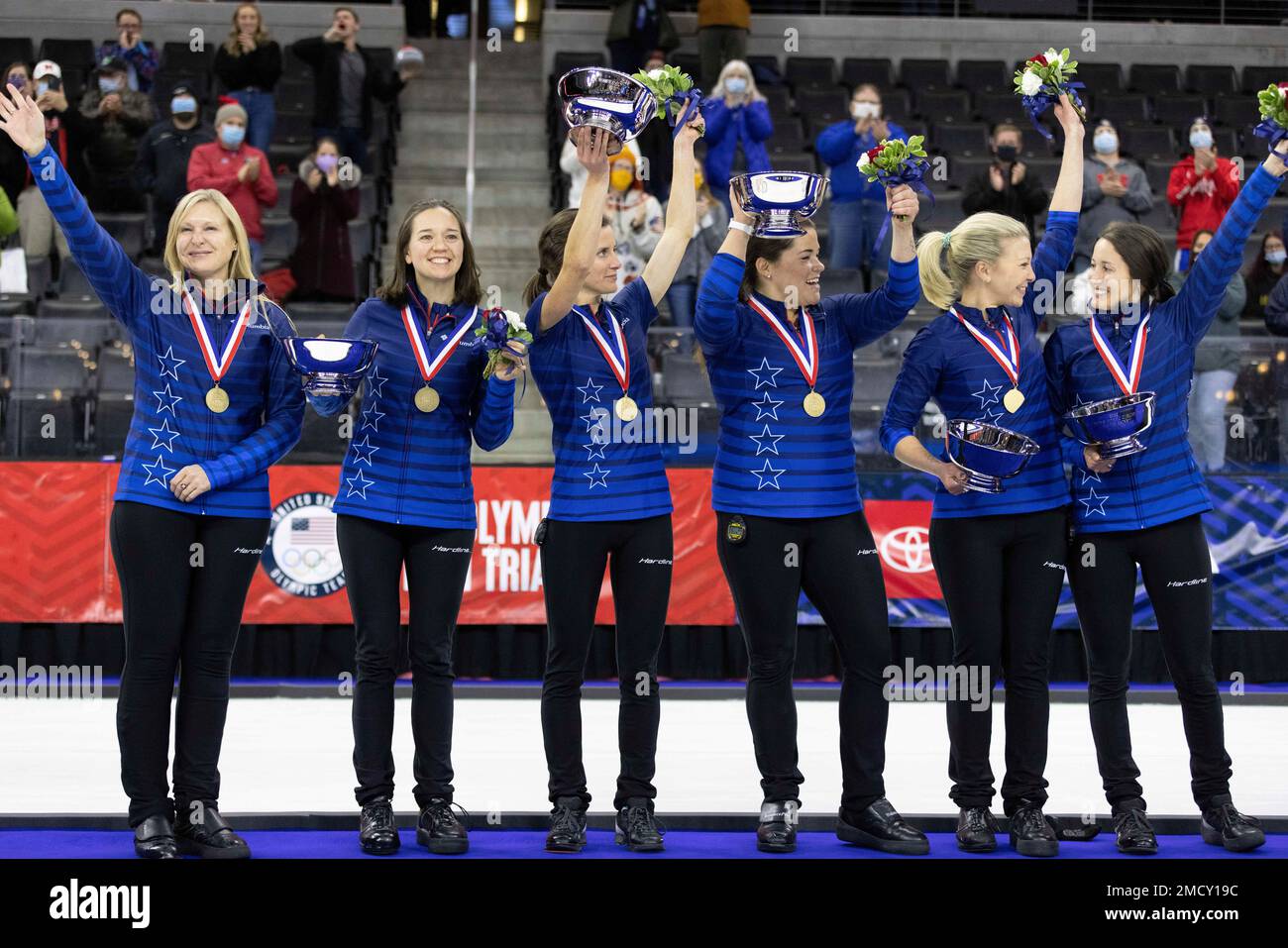 From left, Team Peterson's coach Laine Peters, alternate Aileen Geving ...